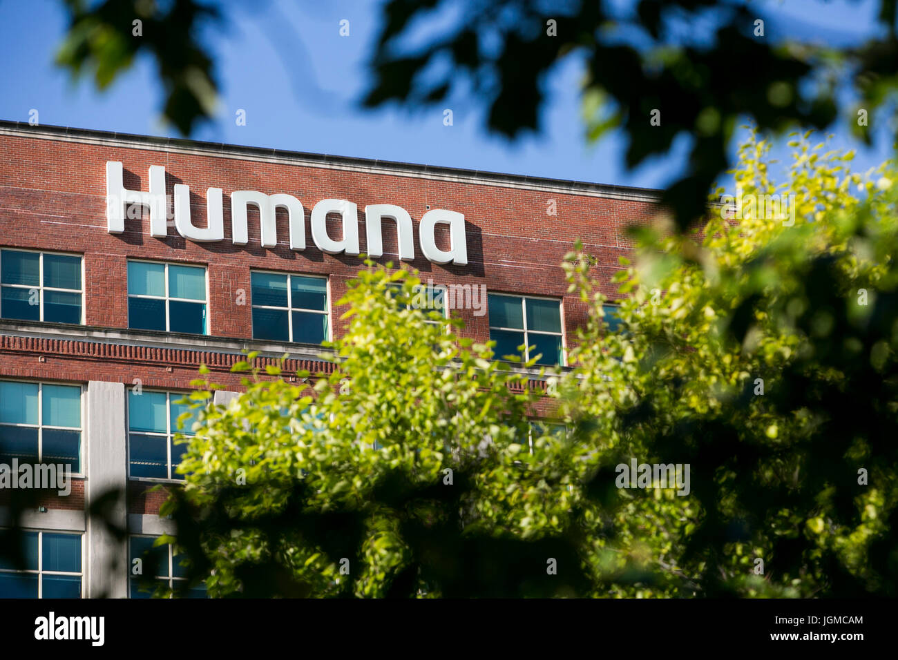 A logo sign outside of a facility occupied by Humana Inc., in ...