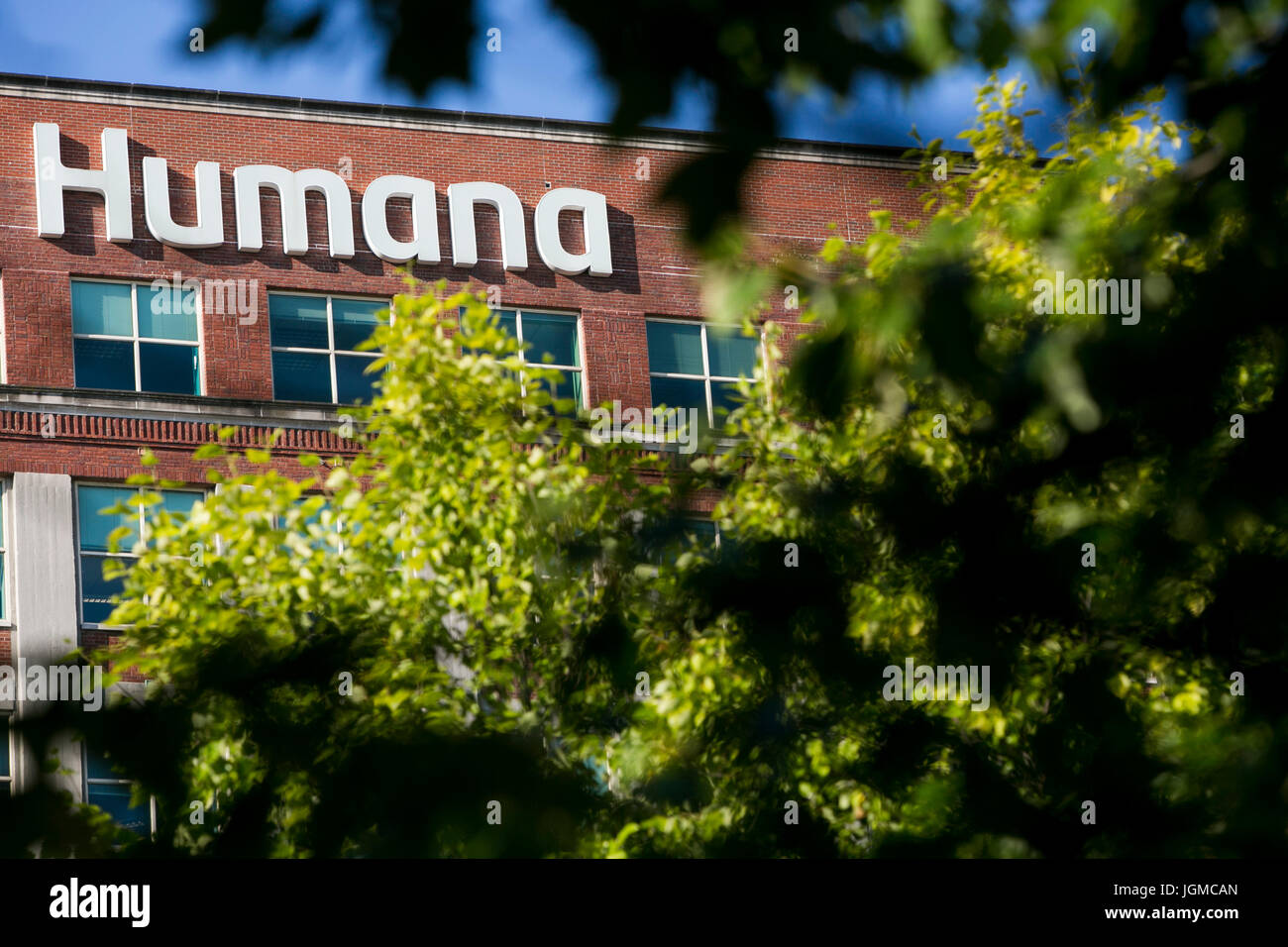 A logo sign outside of a facility occupied by Humana Inc., in ...