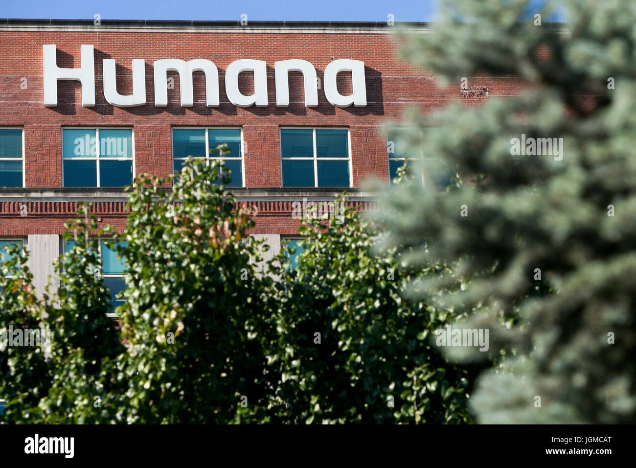 A logo sign outside of a facility occupied by Humana Inc., in ...