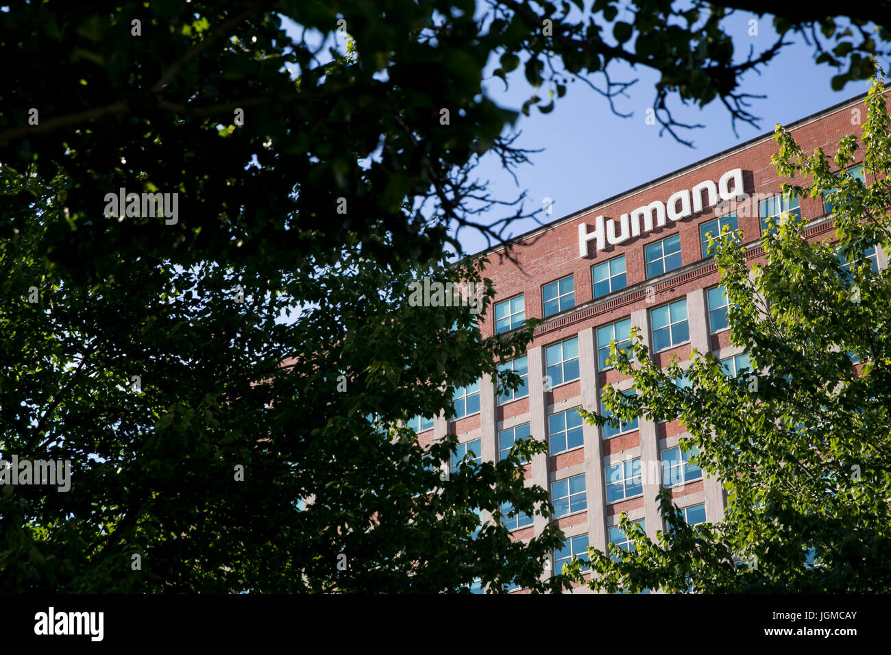 A logo sign outside of a facility occupied by Humana Inc., in ...