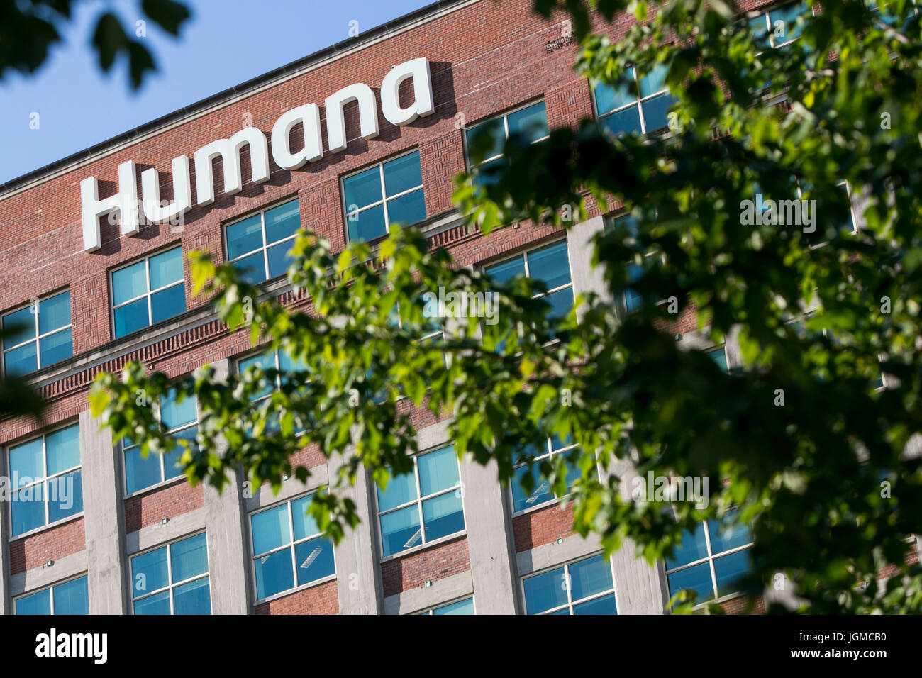 A logo sign outside of a facility occupied by Humana Inc., in ...