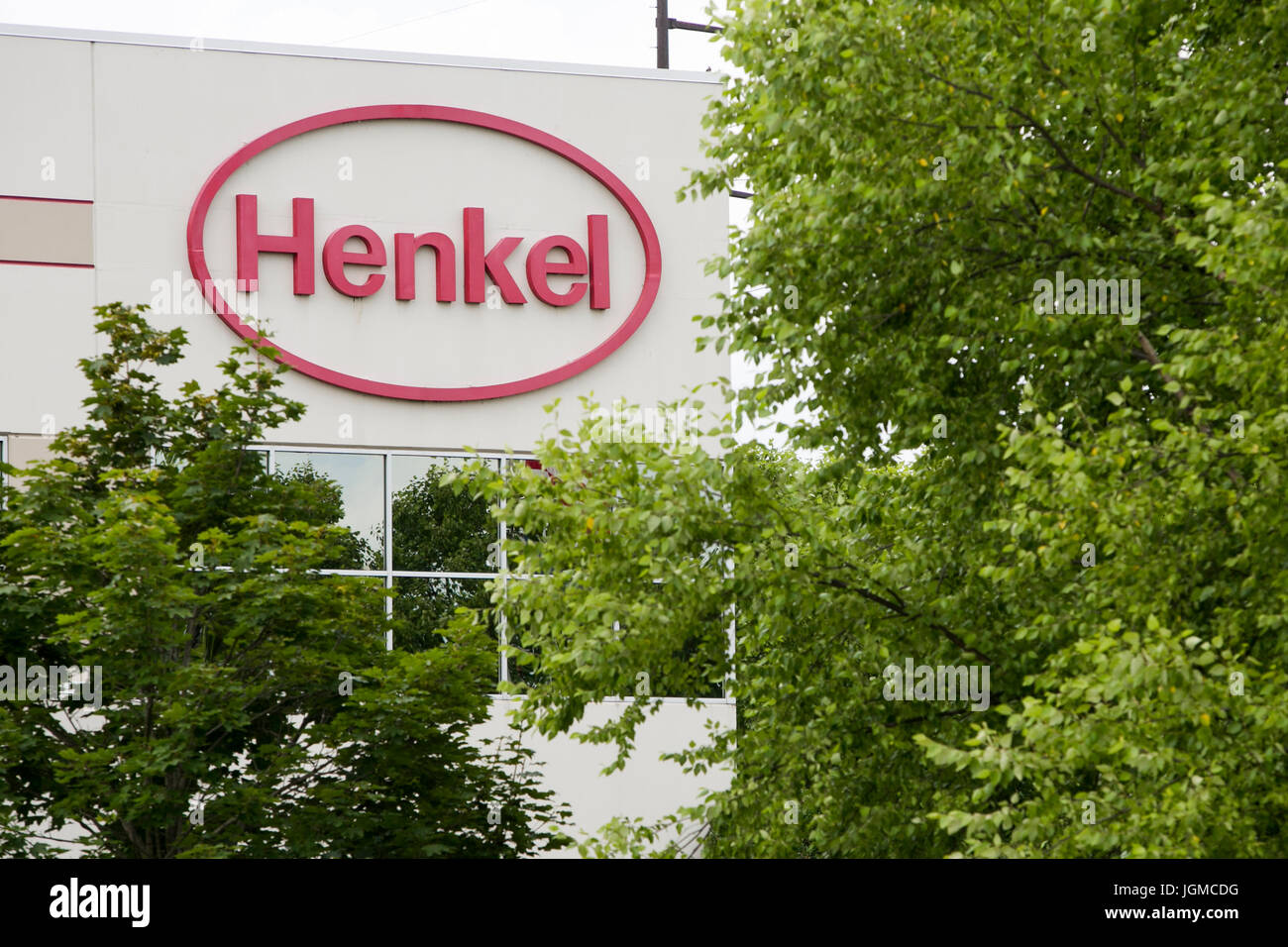 A logo sign outside of a facility occupied by Henkel AG & Company in ...