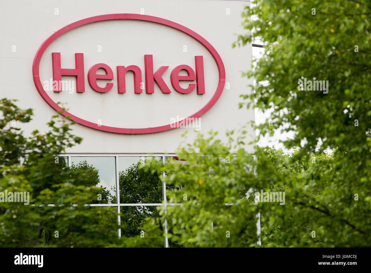 A logo sign outside of a facility occupied by Henkel AG & Company in ...