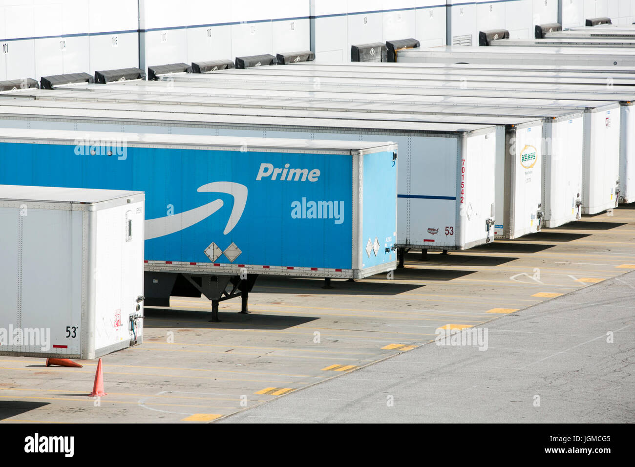 An Amazon Prime logo seen on semi truck trailers outside of a Amazon Fulfillment Center in ...