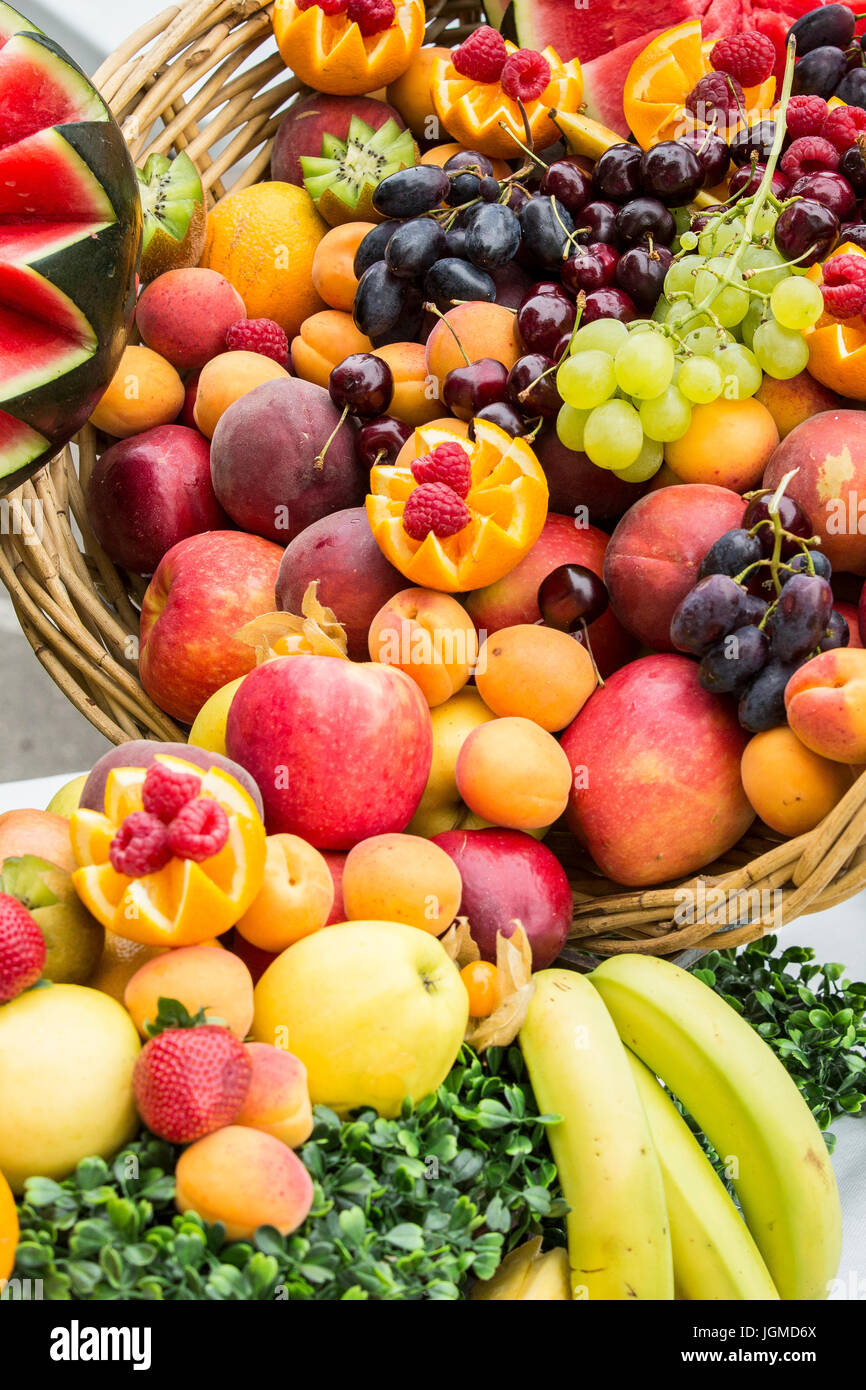 Composition of assortment of fresh fruits in baskets Stock Photo - Alamy