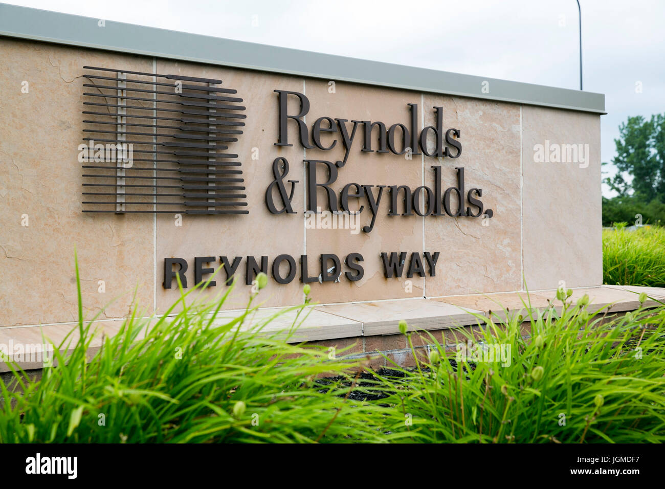 A logo sign outside of the headquarters of The Reynolds and Reynolds ...