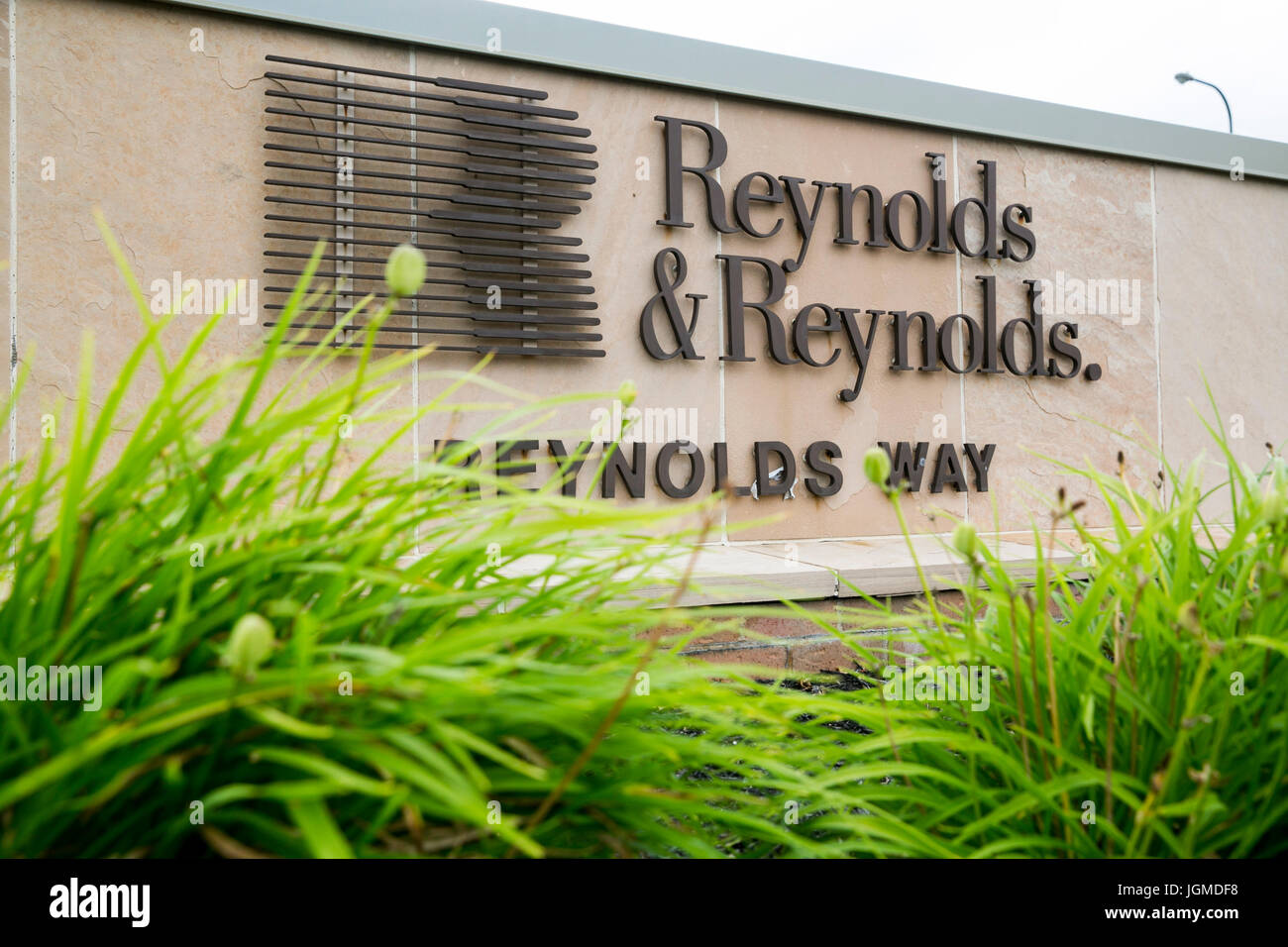 A logo sign outside of the headquarters of The Reynolds and Reynolds ...
