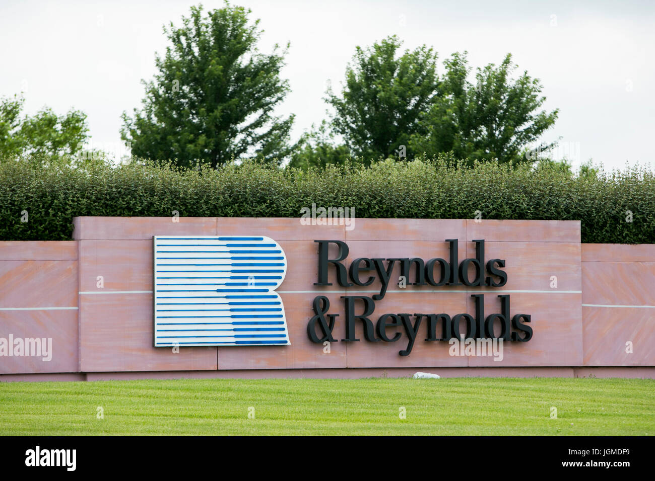 A logo sign outside of the headquarters of The Reynolds and Reynolds ...