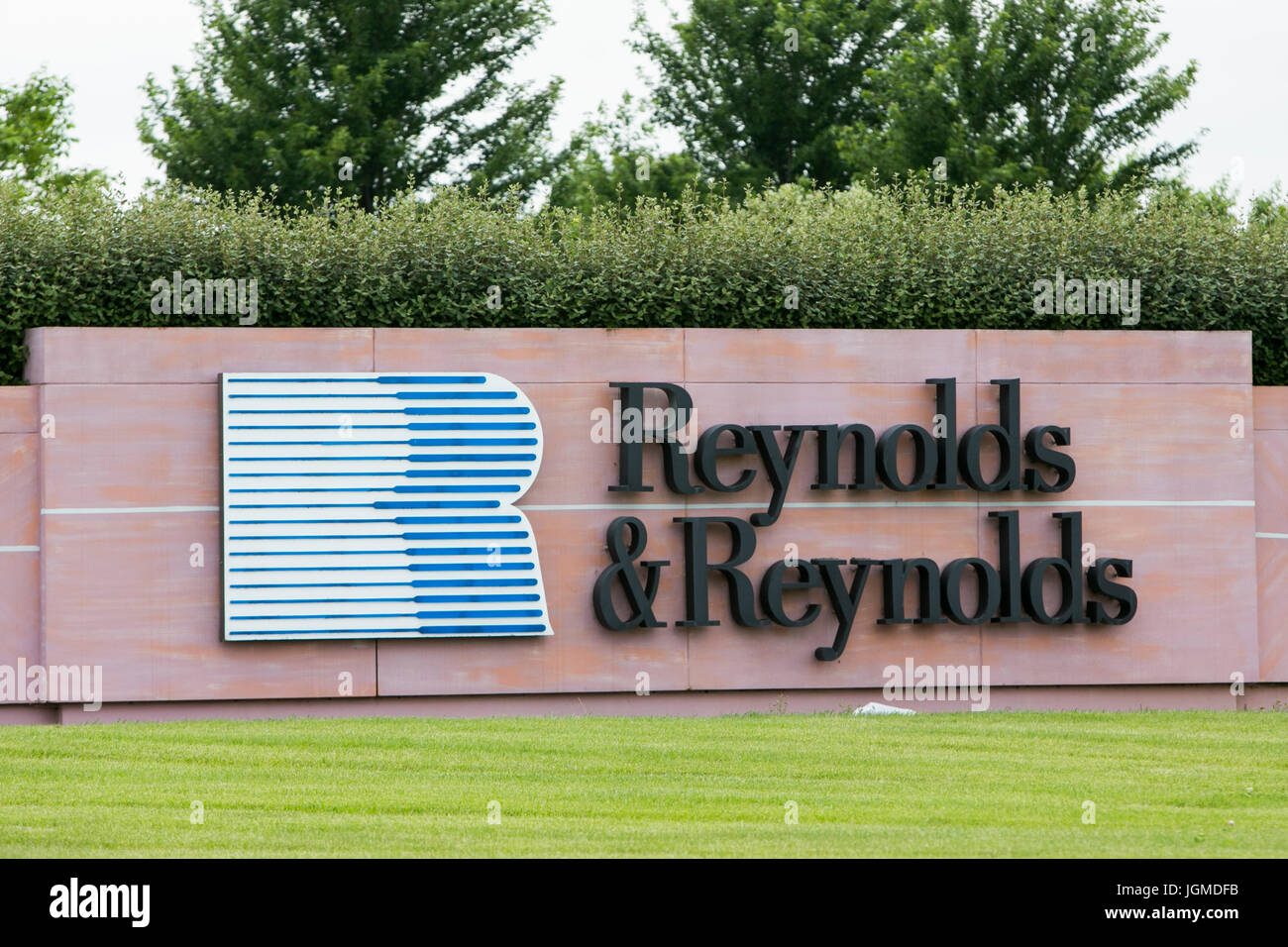 A logo sign outside of the headquarters of The Reynolds and Reynolds ...
