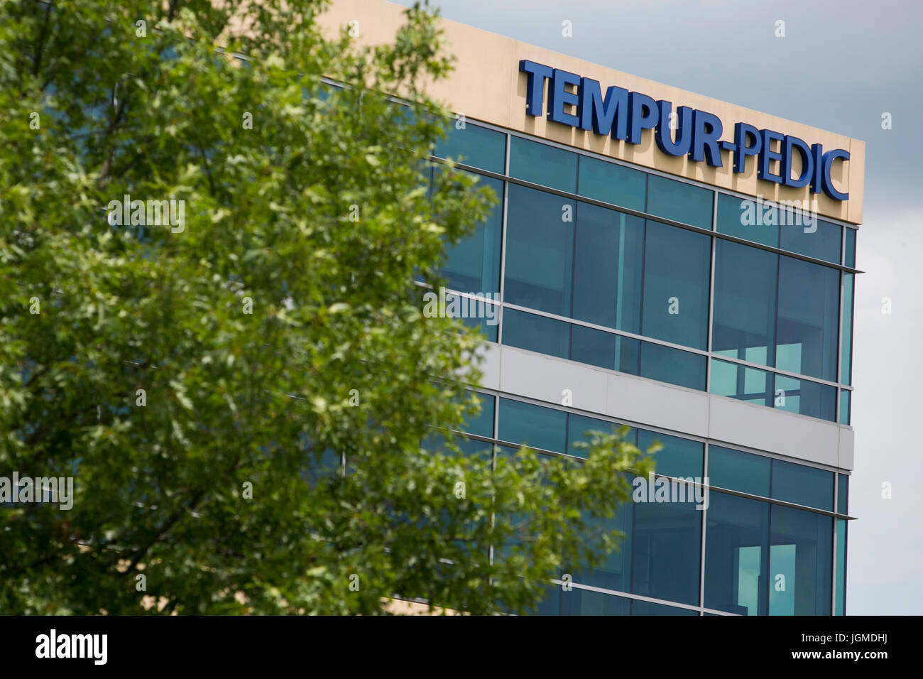 A logo sign outside of the headquarters of Tempur Sealy International ...