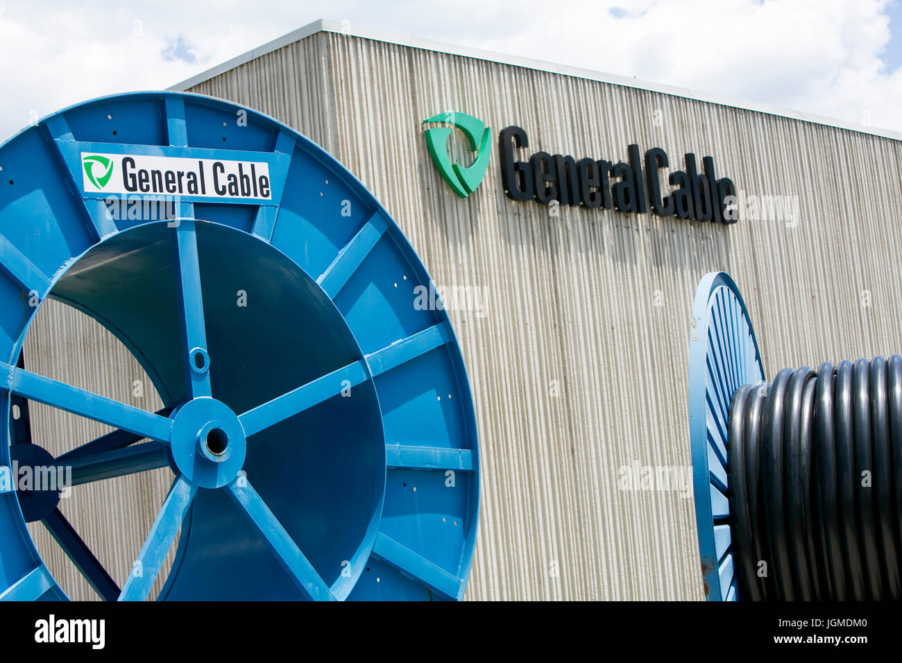 A logo sign outside of the headquarters of General Cable in Highland ...