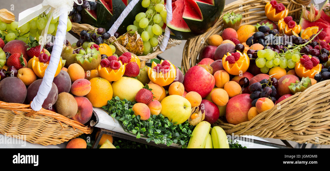 Composition of assortment of fresh fruits in baskets Stock Photo - Alamy