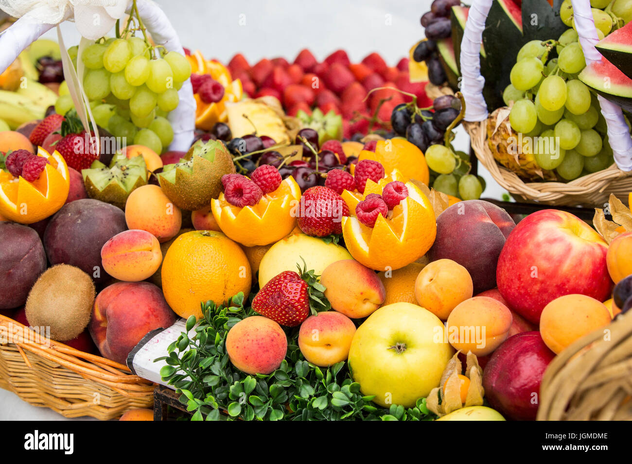Composition of assortment of fresh fruits in baskets Stock Photo - Alamy