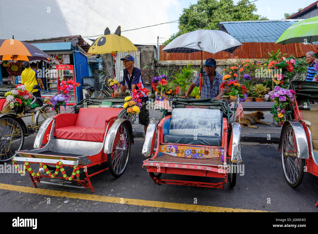 Trishaw (locally know as 'beca') drivers waiting for clients on the ...