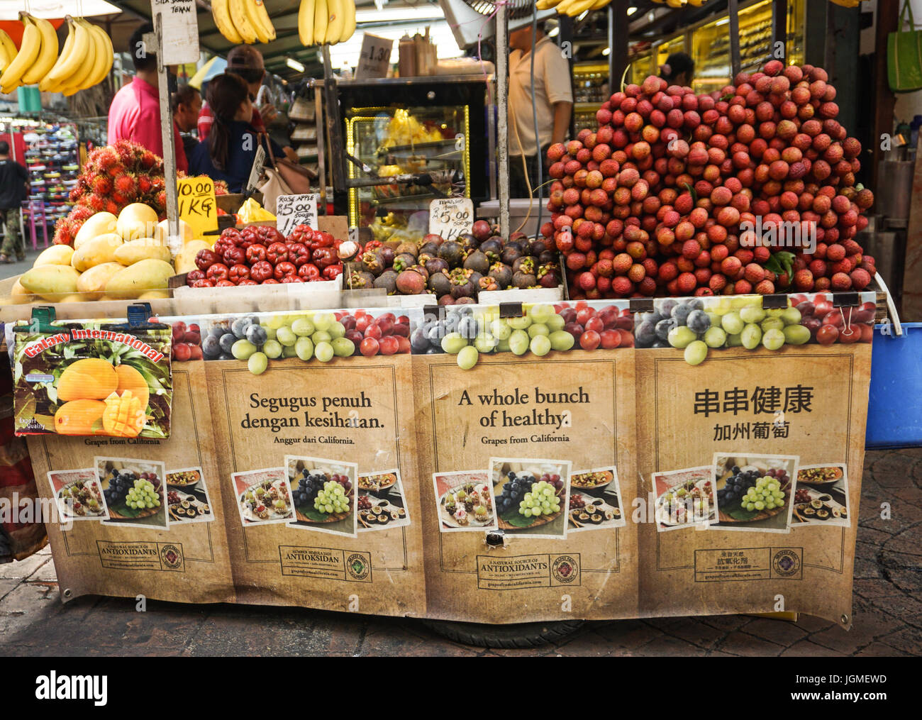 Kuala Lumpur, Malaysia - Jun 6, 2015. Fruits for retail sale at local ...