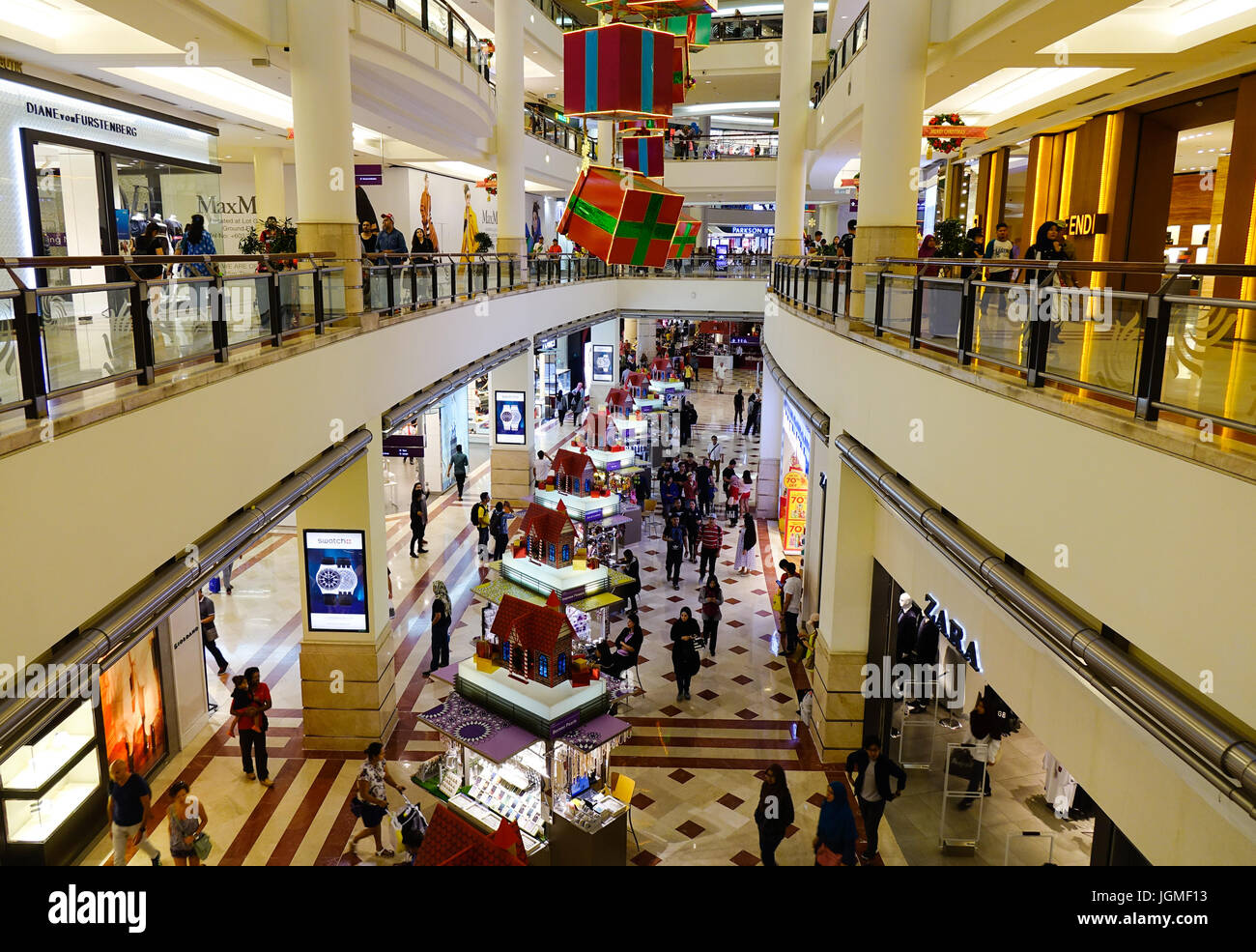 KUALA LUMPUR, MALAYSIA - JAN 2. People walking inside Suria KLCC in KL ...
