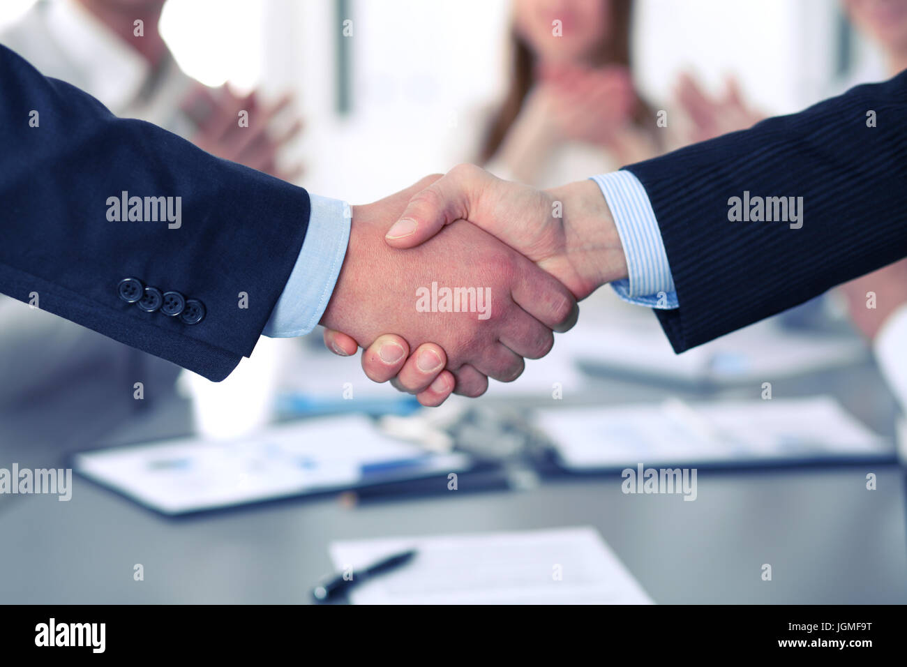 Business handshake in office. Success communication concept Stock Photo ...