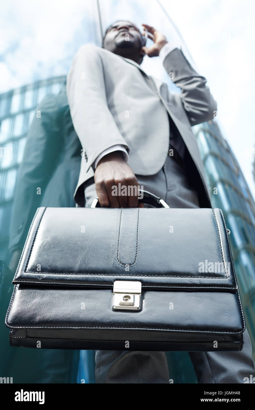 African businessman carrying briefcase hi-res stock photography and ...