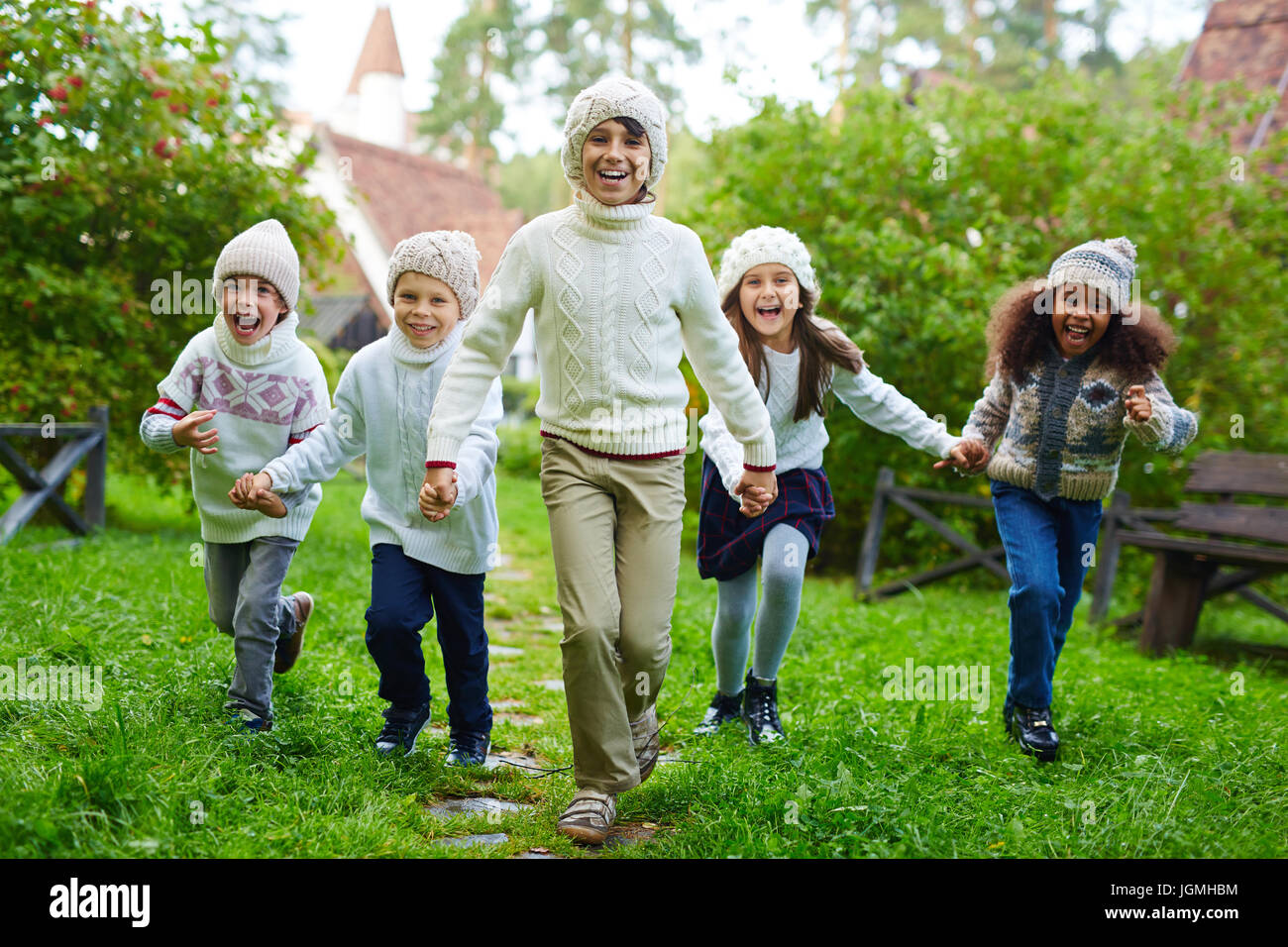 Happy children running hi-res stock photography and images - Alamy