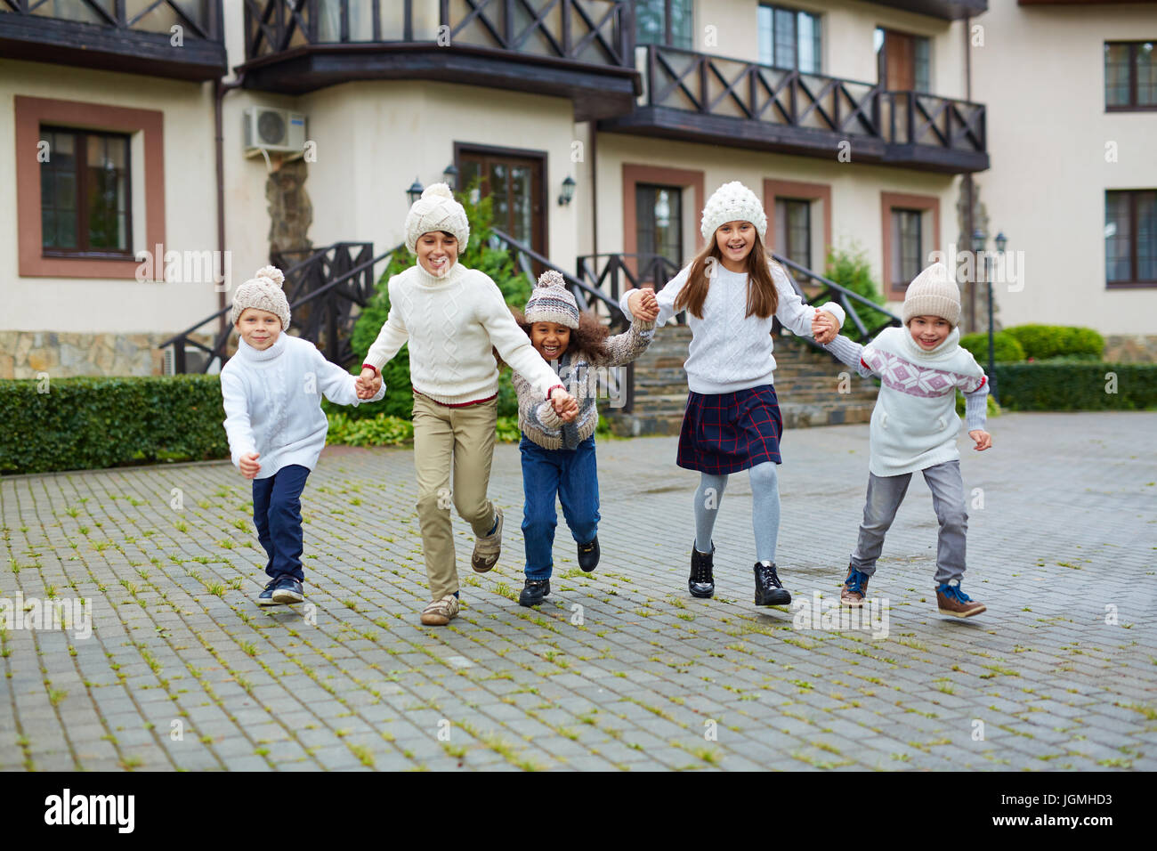 Children running towards camera hi-res stock photography and images - Alamy