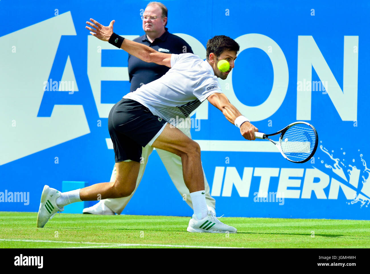 Novak djokovic stretching hi-res stock photography and images - Alamy