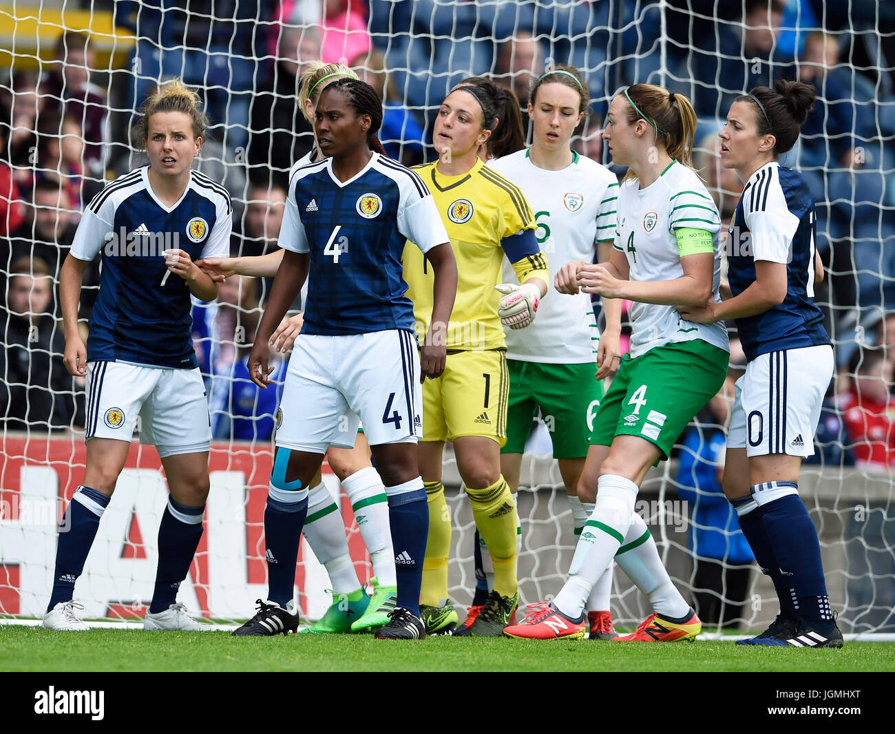Scotland's goalkeeper Gemma Fay is jostled by Ireland's Karen Duggan (6 ...