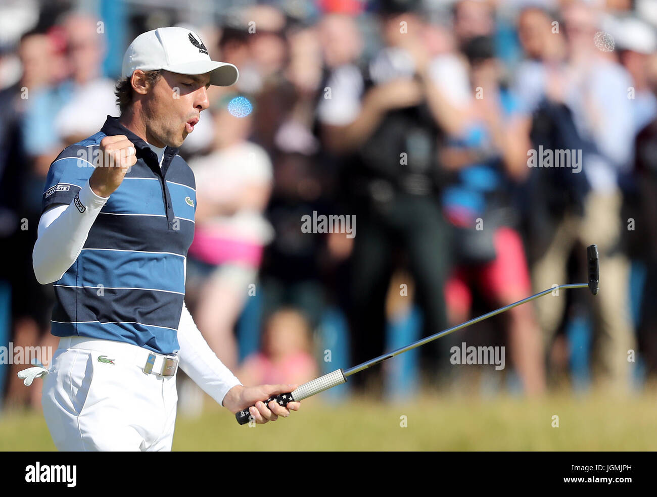 France's Benjamin Hebert celebrates his final point on the 18th green ...