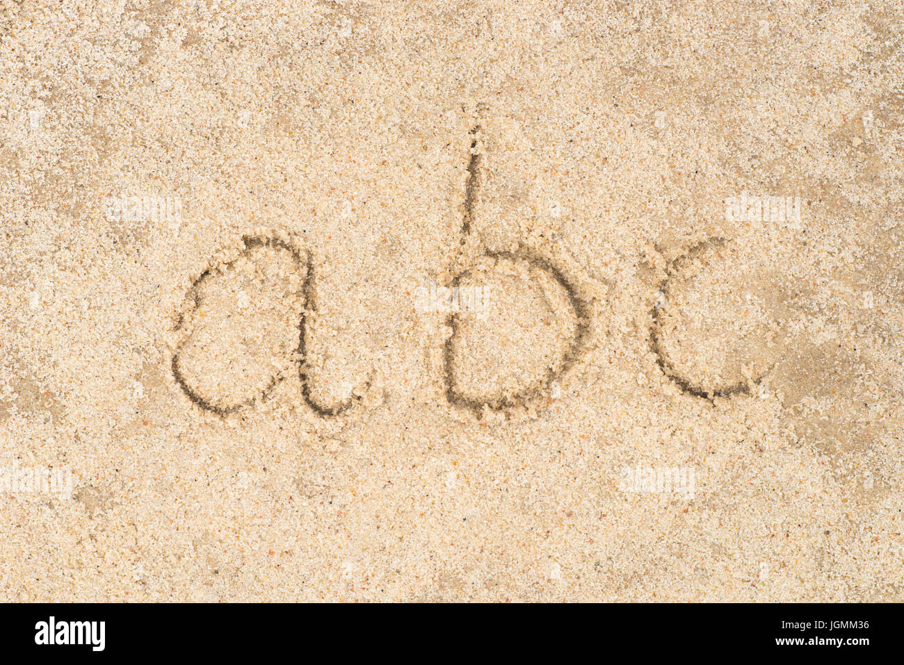 abc abc written in sand background Stock Photo - Alamy