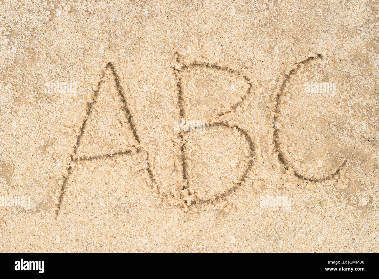 abc abc written in sand background Stock Photo - Alamy
