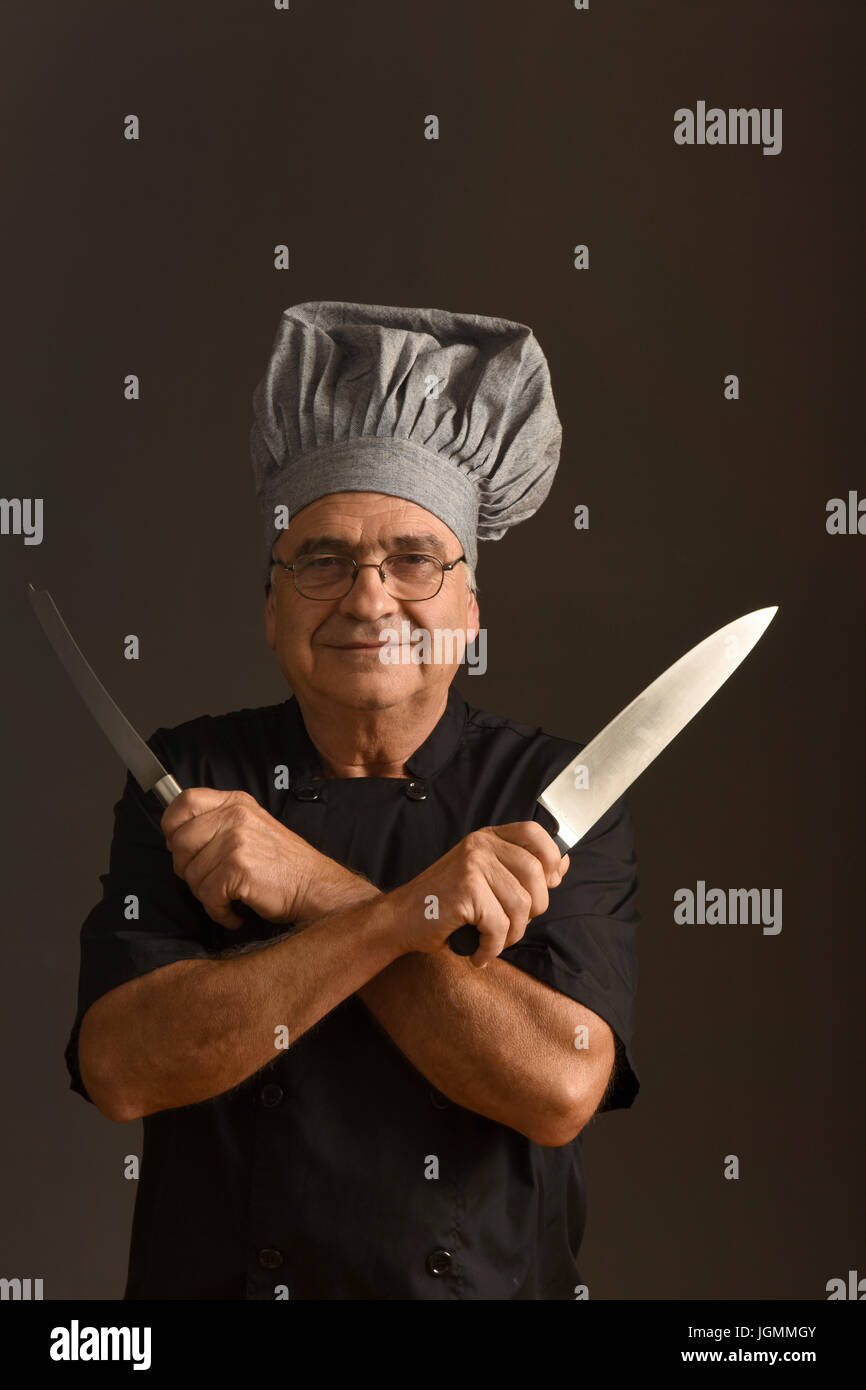 Portrait of a senior chef Stock Photo - Alamy