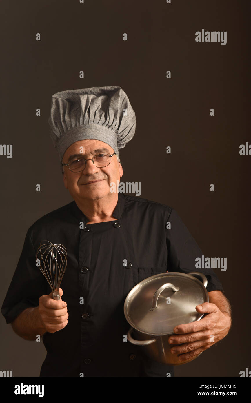 Portrait of a senior chef Stock Photo - Alamy