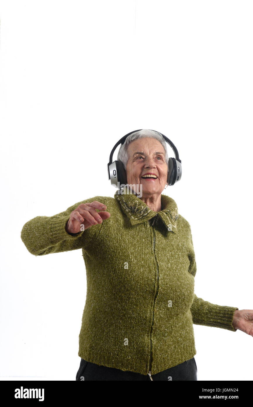Senior woman dancing with white background Stock Photo - Alamy