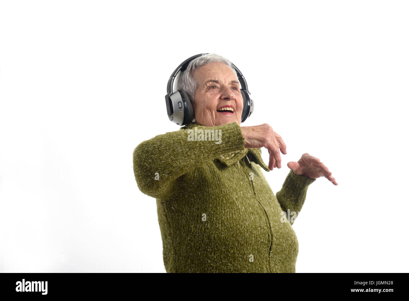 Senior woman dancing with white background Stock Photo - Alamy