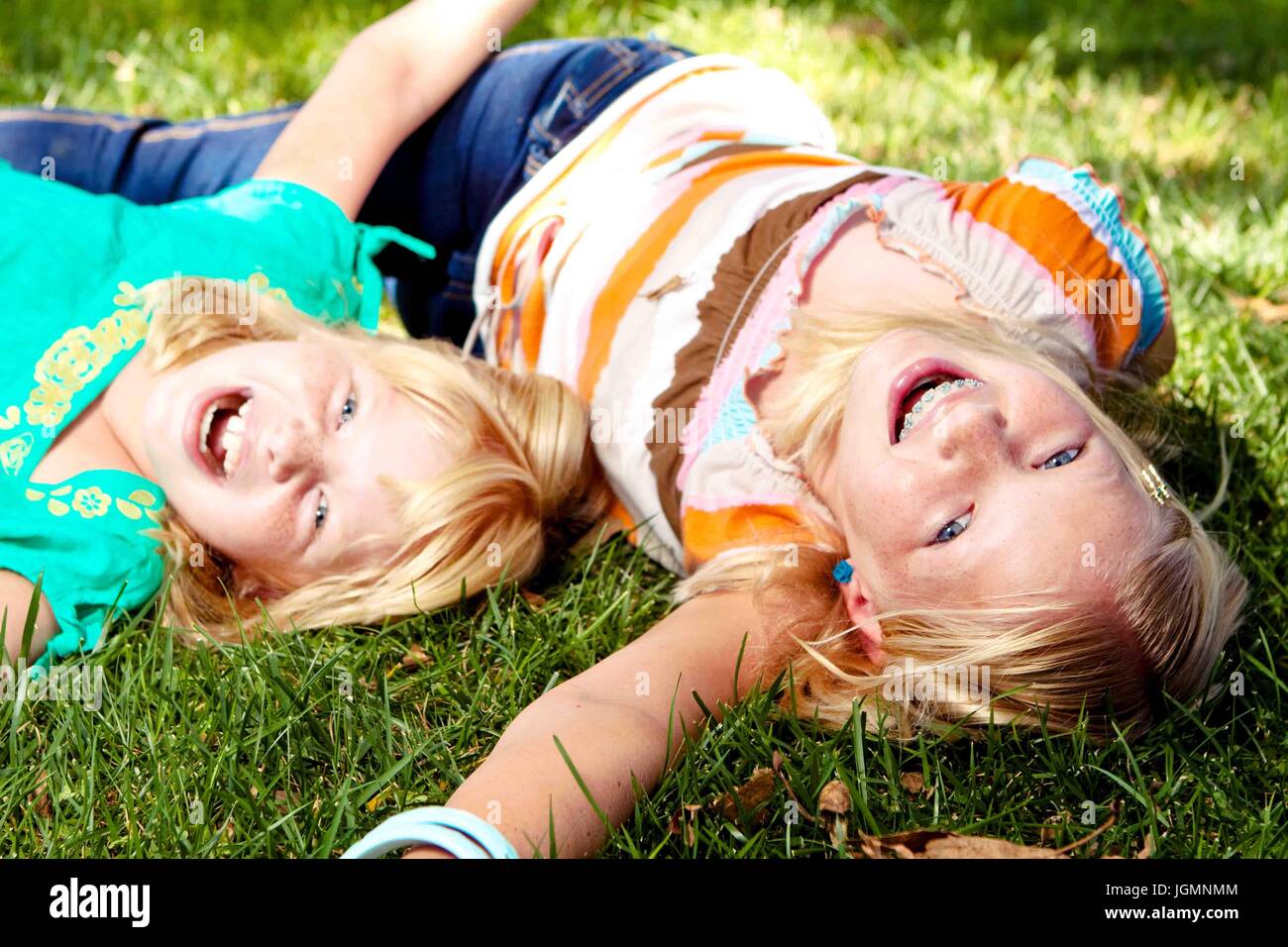 Portrait of two sisters laughing and having fun Stock Photo - Alamy