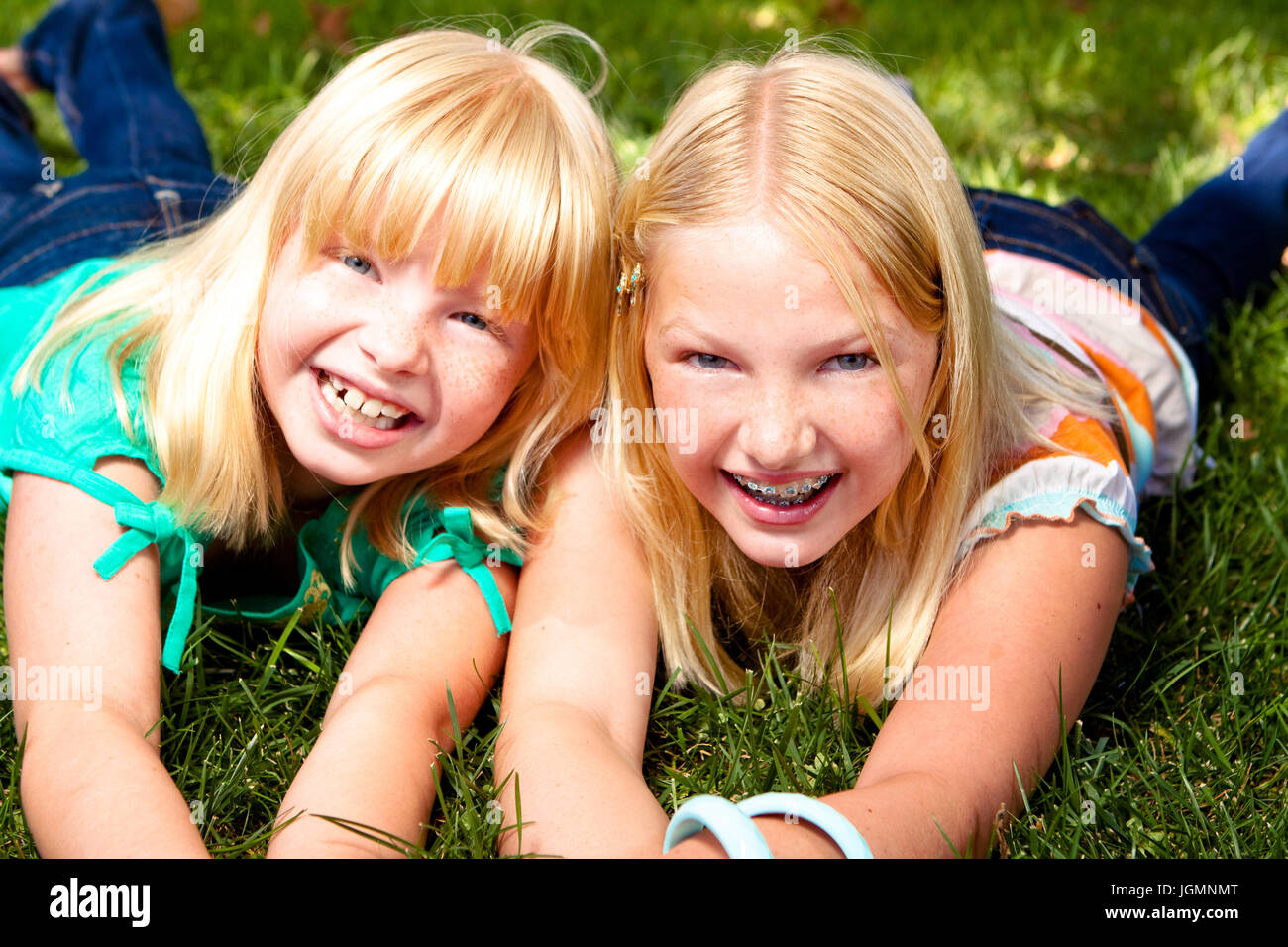 Portrait of two sisters laughing and having fun Stock Photo - Alamy
