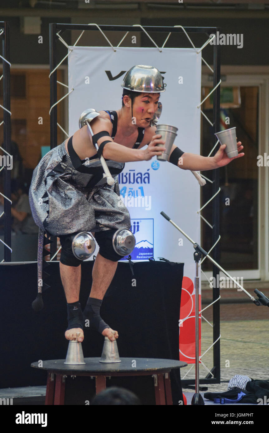 Comic juggler at a street festival in Bangkok, Thailand Stock Photo - Alamy