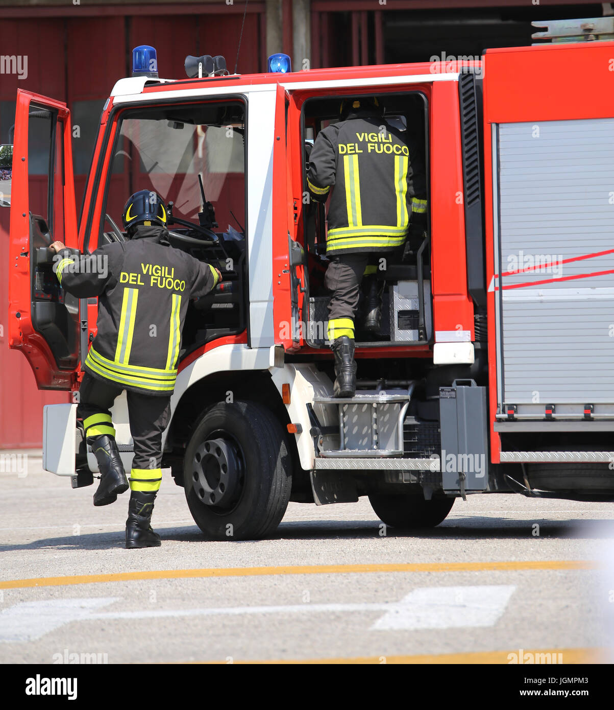 Italian firefighters with uniforms with the word meaning firemen in ...