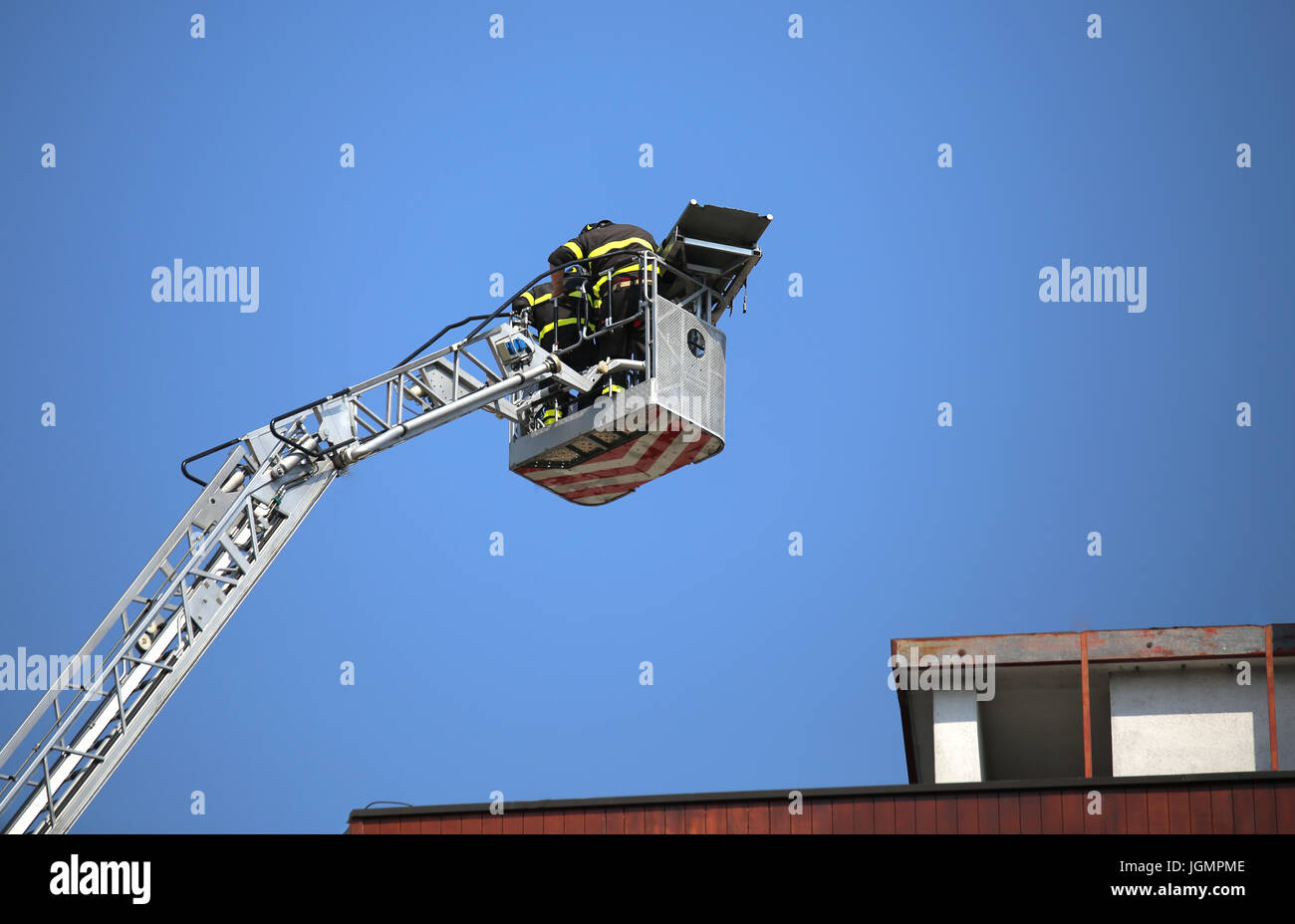 Firefighter team as they help the wounded with the stretcher fixed ...