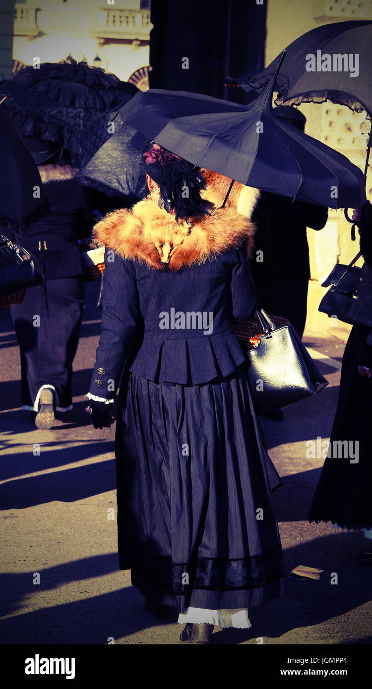 Old Ladies Dressed In Vintage Clothes And A Black Umbrella With Vintage Old Ladies Dressed In Vintage Clothes And A Black Umbrella With Vintage