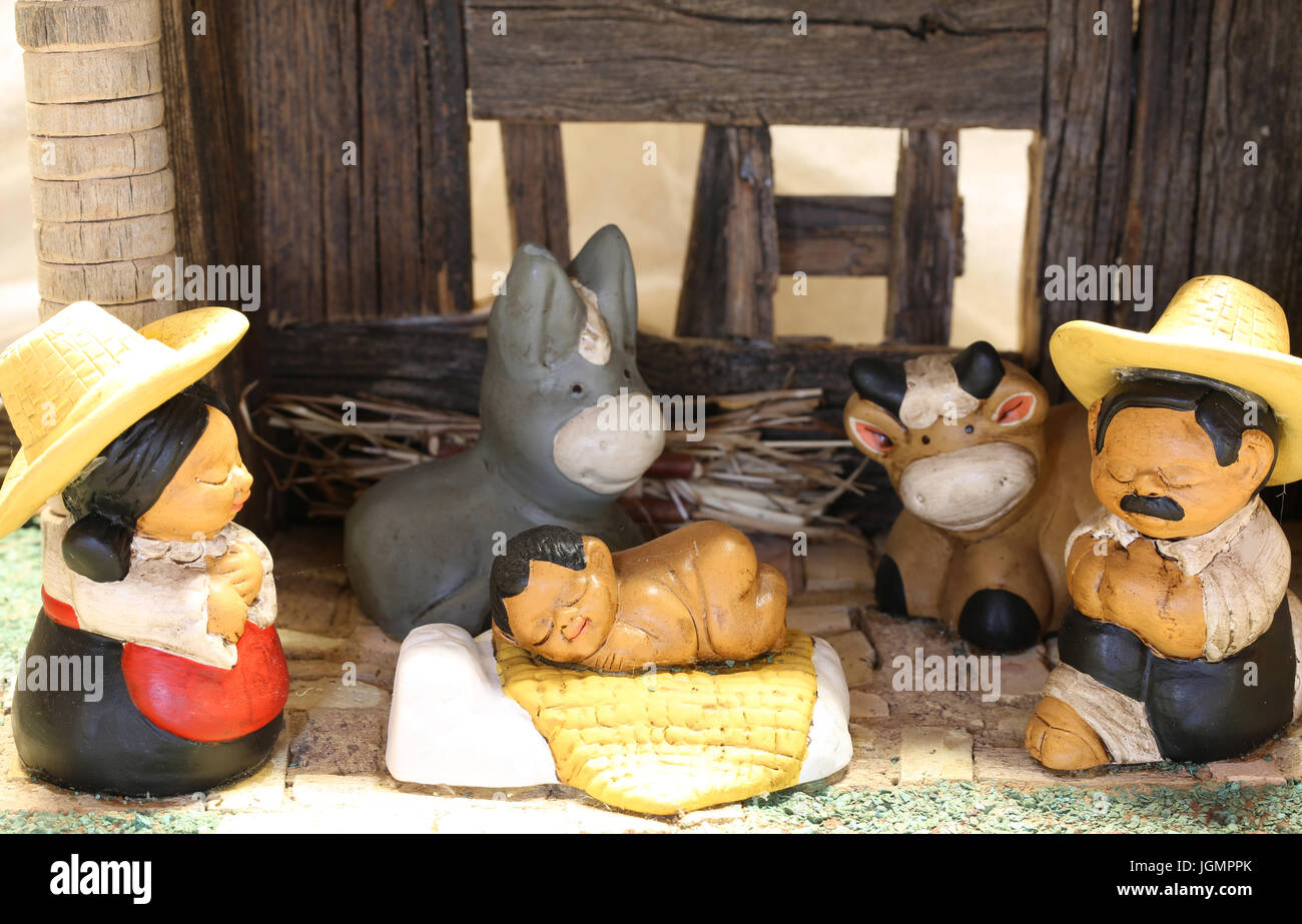 Mexican Nativity scene with holy family in clothes in South American ...