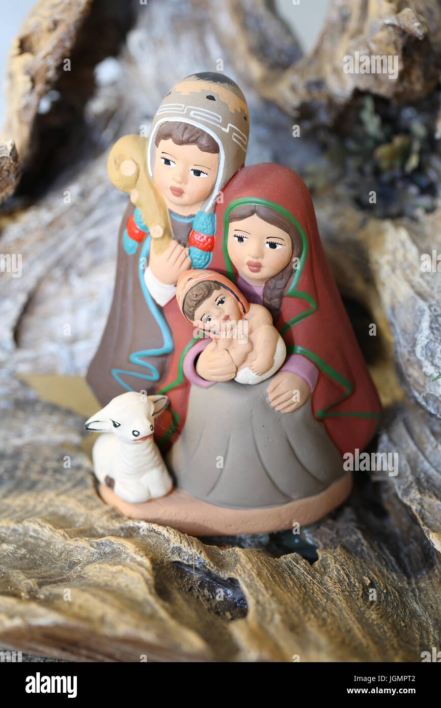 peru family with winter clothes made of ceramic material which ...