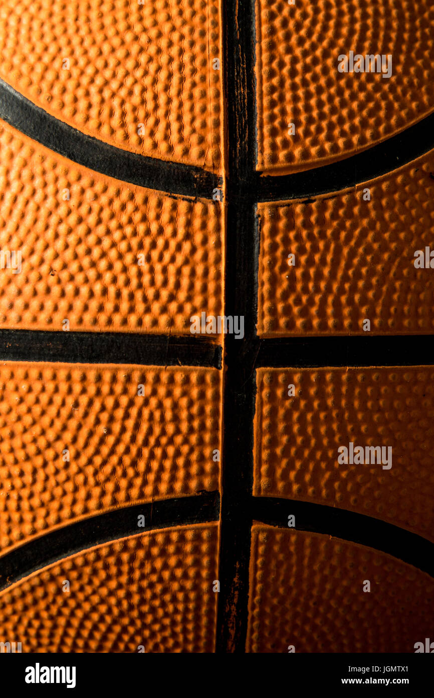 A single basketball isolated on a black background Stock Photo - Alamy