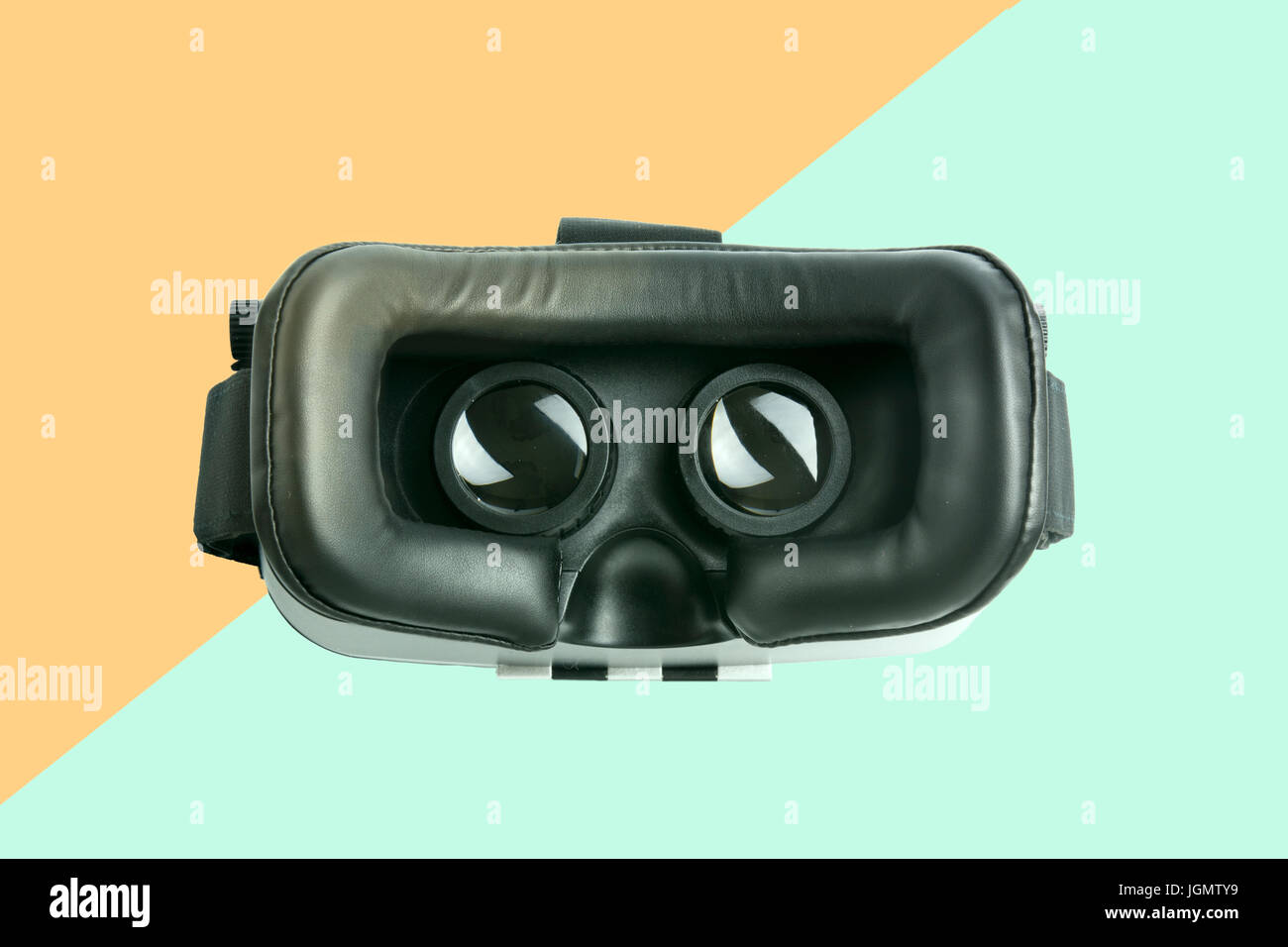 Close up of virtual reality goggles, geometric shapes of background ...