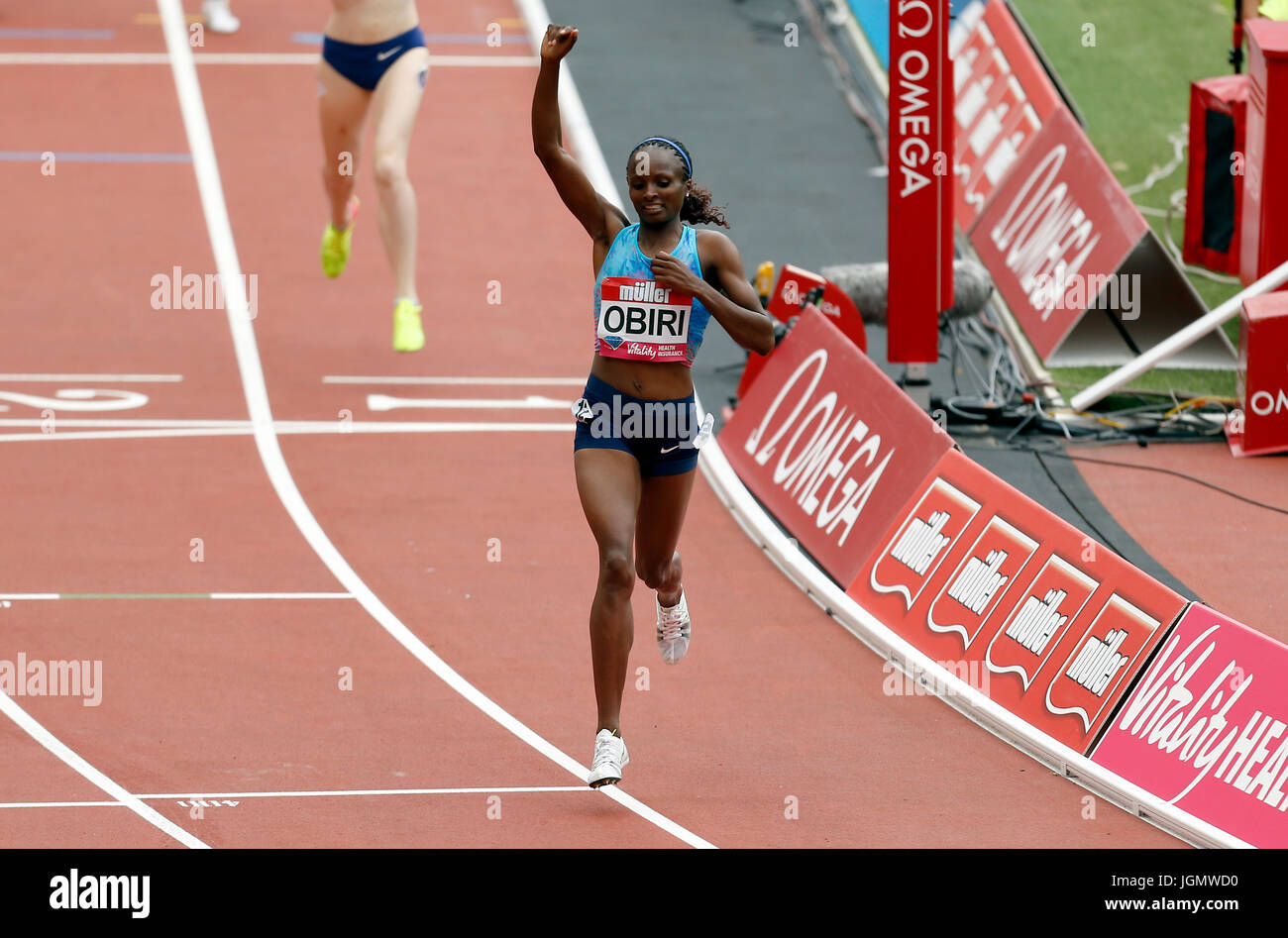 Kenya's Hellen Obiri celebrates winning the Women's Mile race during ...