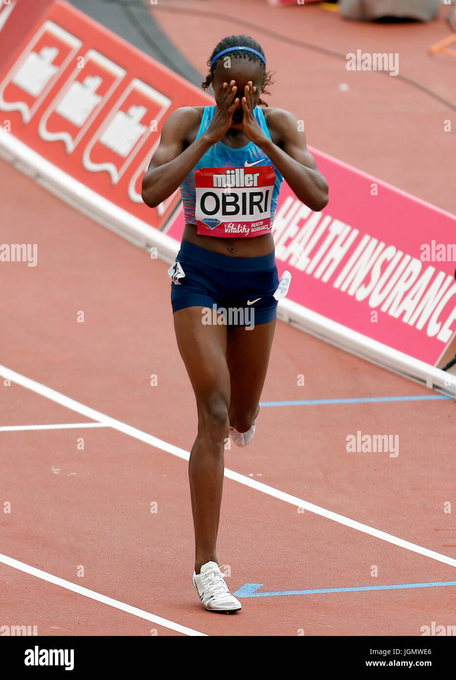 Kenya's Hellen Obiri celebrates winning the Women's Mile race during ...