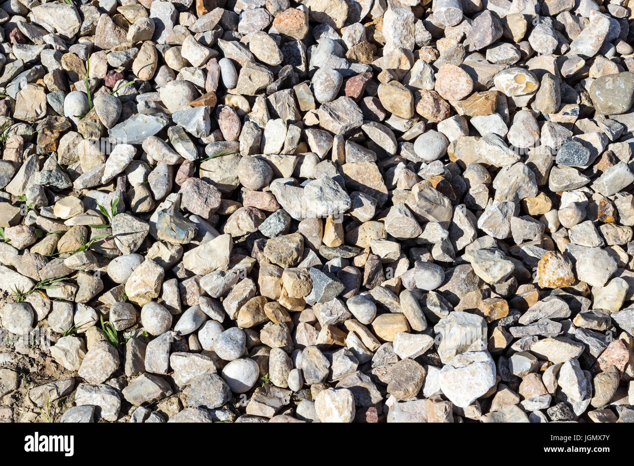 Set of small and medium stones in bright sun pattern background Stock ...