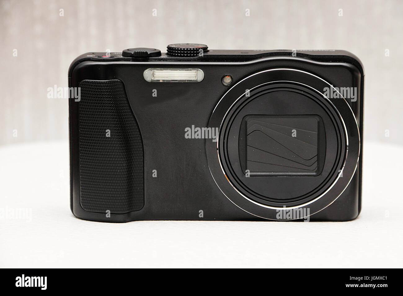 Compact modern digital camera on a neutral background Stock Photo - Alamy