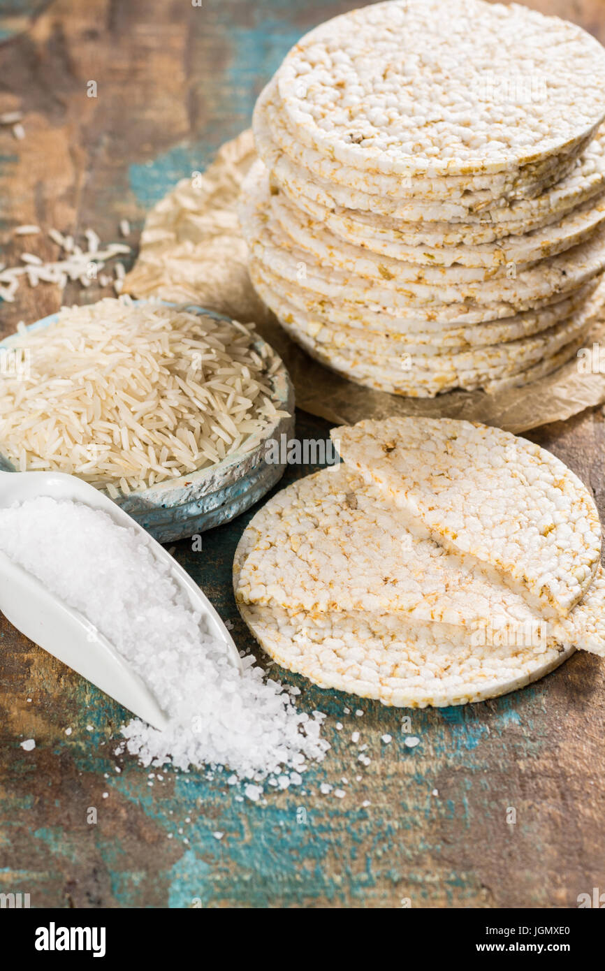 Healthy puffed rice cakes crackers stacked with sea salt close up Stock ...