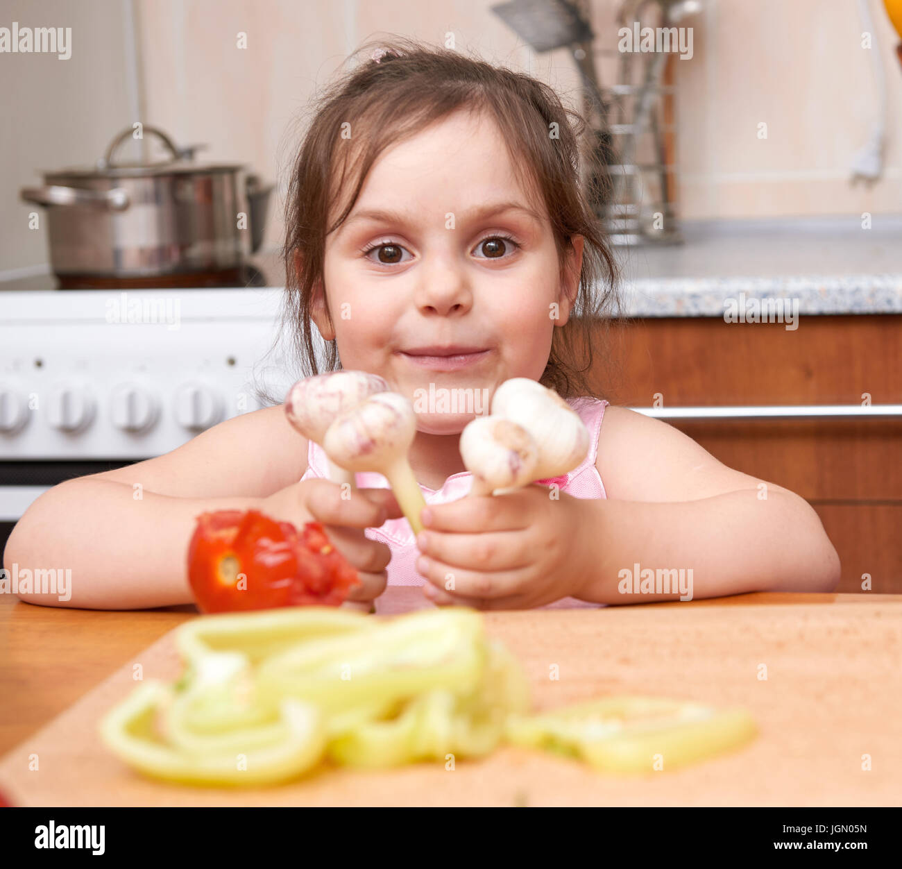Children at the table with with fresh fruits and vegetables, home ...