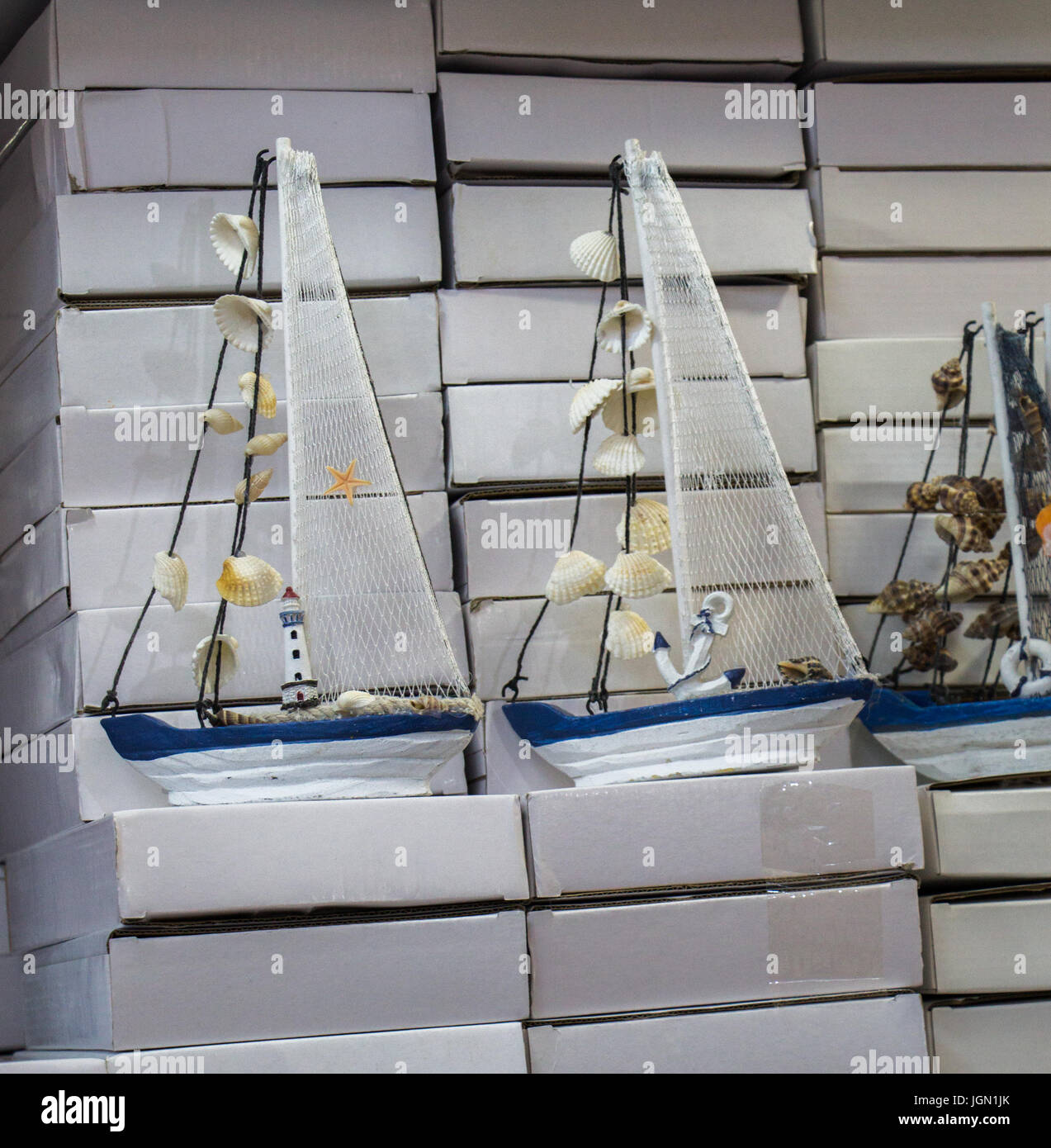 Hand made sail boats in view Stock Photo - Alamy